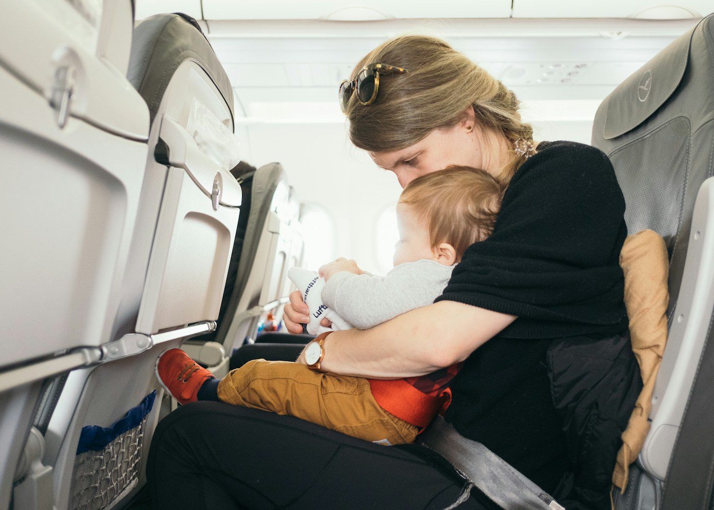 Flying solo with kids: Tips for surviving flights on your own